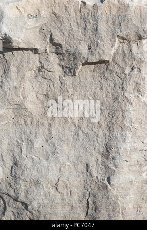 Closeup limestone rock face showing weathered strata and details for ...