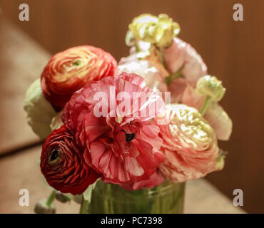 Bouquet of colorful ranunculus flowers. Party decor Stock Photo - Alamy