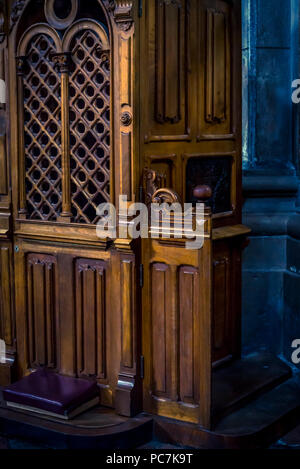 Traditional wooden confessional Stock Photo - Alamy