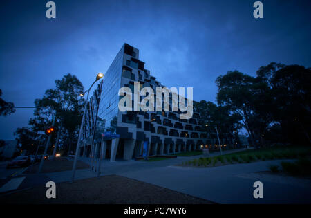 Logan Hall, halls of residence Monash University buildings at night ...