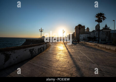 Sunset at water front at Cadiz, Spain Stock Photo - Alamy
