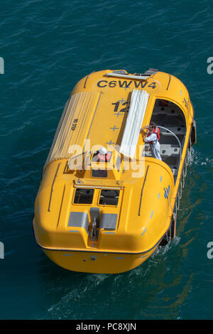 A yellow lifeboat from the Royal Caribbean Independence of the Seas ...