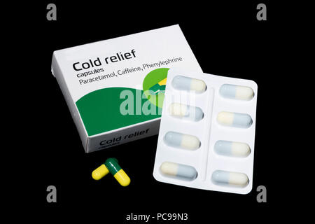 Head cold relief medication capsules with paracetamol, caffeine and ...