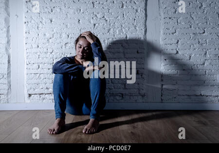 Young devastated depressed woman crying sad feeling hurt suffering ...