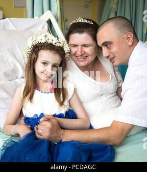 Cancer patient Kayleigh Walsh (left) with her parents Lyndsey and Paul ...