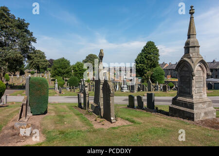 Graves in the cemetery at Kirriemuir in Scotland. A place to go an ...
