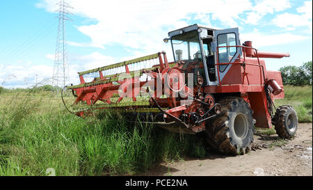Combine machine getting ready to start the harvest at a rice field in ...