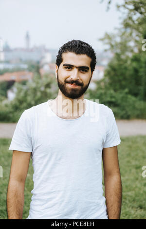 Outdoor portrait of cheerful Syrian man Stock Photo - Alamy
