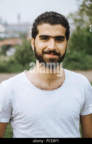 Outdoor portrait of cheerful Syrian man Stock Photo - Alamy