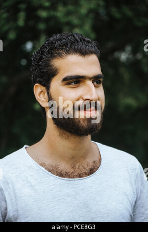 Outdoor portrait of cheerful Syrian man Stock Photo - Alamy