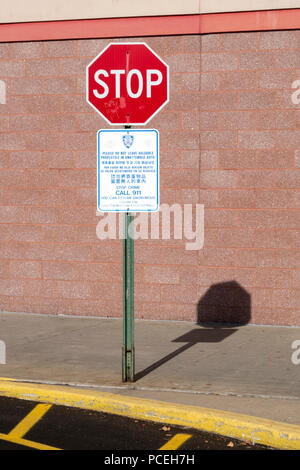 Chinese car parking sign in Beijing, China depicting standard symbols ...