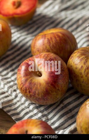 Organic Red Mottled Pluots Ready to Eat Stock Photo - Alamy
