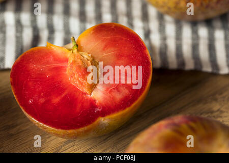 Organic Red Mottled Pluots Ready to Eat Stock Photo - Alamy