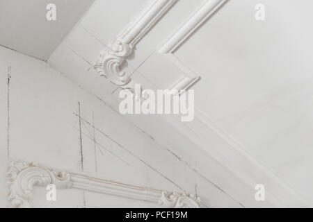 unfinished plaster molding on the ceiling. decorative gypsum finish ...