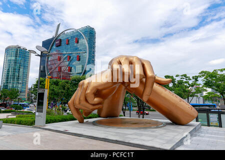 Bronze statue of Gangnam Style famous kpop song by Psy in front of the ...