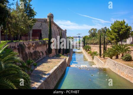 Canal Torrent de Sa Riera in street Passeig de mallorca in town centre ...