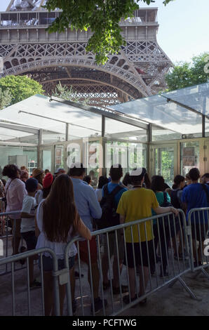A security fence around the Eiffel Tower which is filled with ...