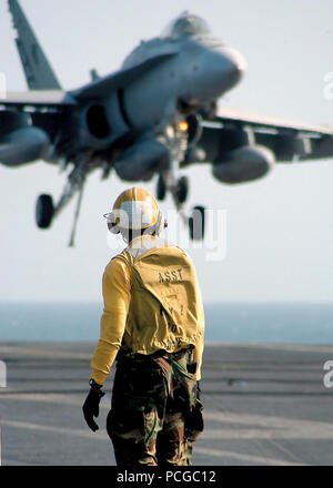 A Strike-Fighter Squadron 131 (VFA-131) F/A-18A Hornet aircraft, armed ...