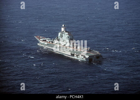 An aerial port quarter view of a Soviet Krivak class missile frigate ...