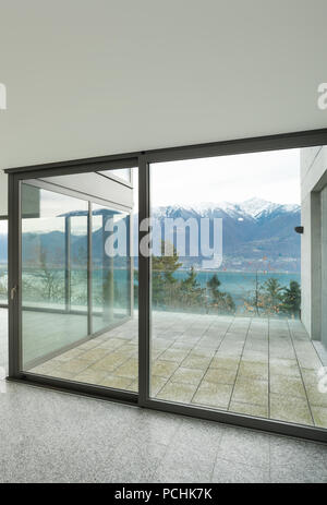 Detail of modern room with stone wall Stock Photo - Alamy