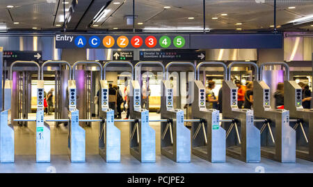 entrance gates at subway station platform New York City USA Stock Photo ...
