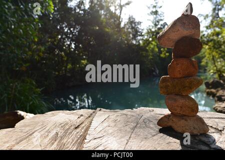 Rock balancing art at Cardwell Spa Pool, Cardwell, Queensland ...