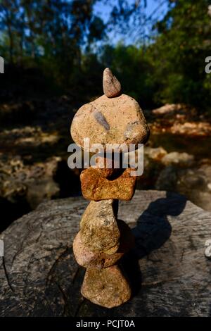 Rock balancing art at Cardwell Spa Pool, Cardwell, Queensland ...