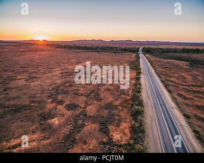 Rural highway leading into Ikara-Flinders Ranges national park at ...
