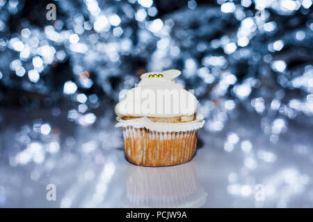 Fancy food cupcake with delicious white icing Stock Photo - Alamy