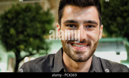 Young man outside at night Stock Photo - Alamy