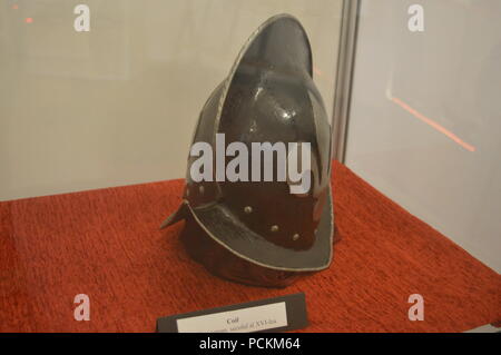 Helmets on display at museum Stock Photo - Alamy