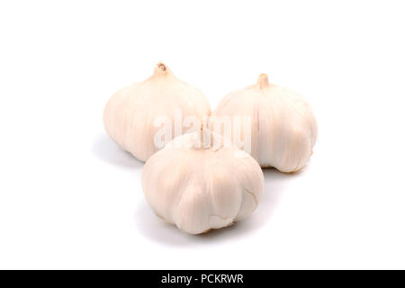 Three garlics on white background. Close up top view Stock Photo - Alamy
