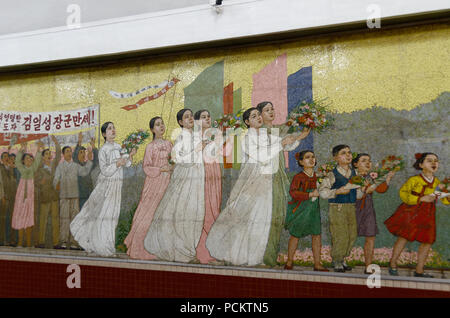Murals painted on the walls of the Pyongyang Metro showing ...