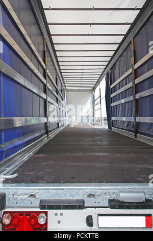 Interior view of empty semi truck trailer Stock Photo - Alamy