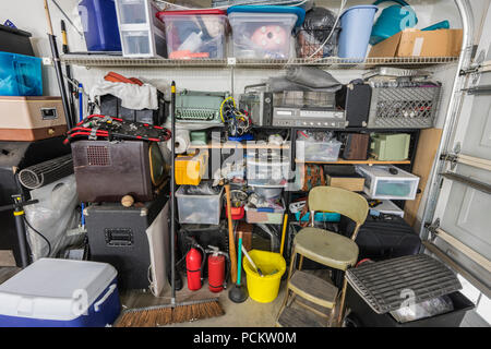 Cluttered interior garage storage Stock Photo - Alamy