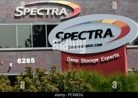 A logo sign outside of the headquarters of Spectra Logic in Boulder ...