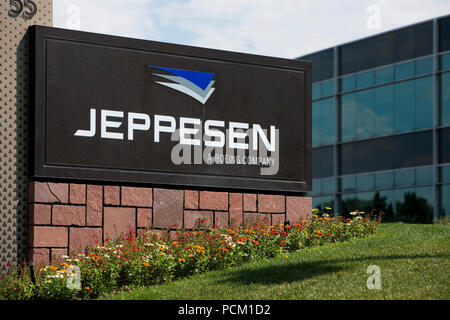 A logo sign outside of the headquarters of Jeppesen in Englewood ...