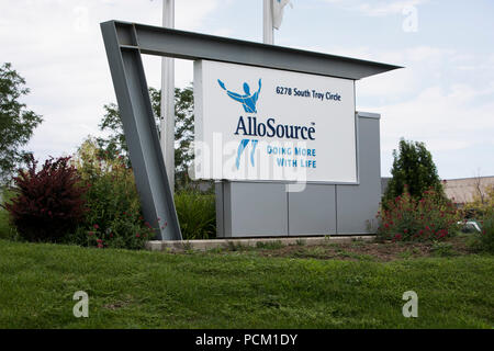 A logo sign outside of the headquarters of AlloSource in Centennial ...
