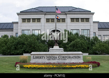 A logo sign outside of the headquarters of Liberty Media Corporation in ...
