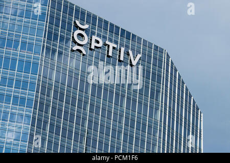 A logo sign outside of the headquarters of Optiv Security, Inc., in ...