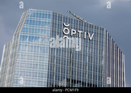 A logo sign outside of the headquarters of Optiv Security, Inc., in ...
