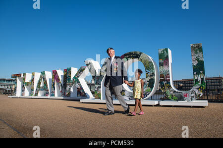 RAF veteran Tom Weatherall, 84, with Maraki Tewodros, five, at the ...