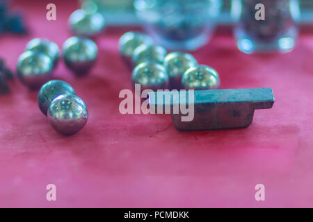 Granulated pure tin after melting in tin mining process Stock Photo - Alamy