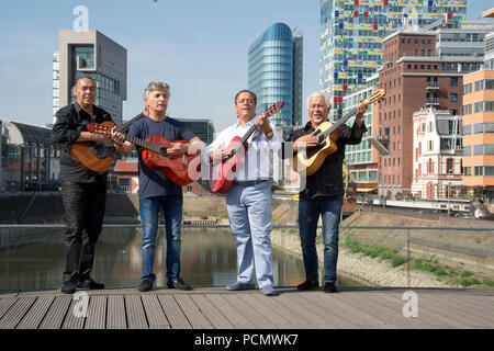 The GIPSY KINGS pose with their guitars for a photo shoot in the ...