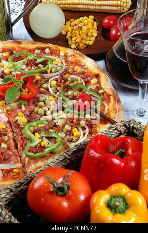 Pizza with corn, bacon, chili, onion, pea Stock Photo - Alamy