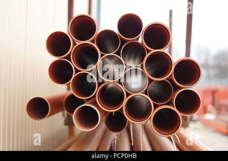 Stack of Many Pipes at the Construction Site Stock Photo - Alamy