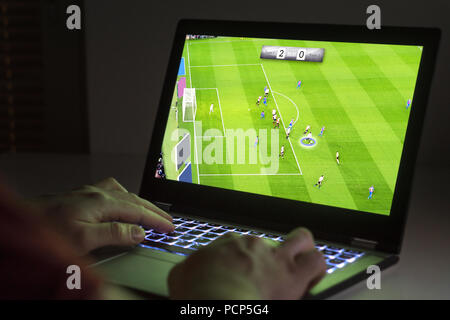Teenager playing computer game at home Stock Photo - Alamy