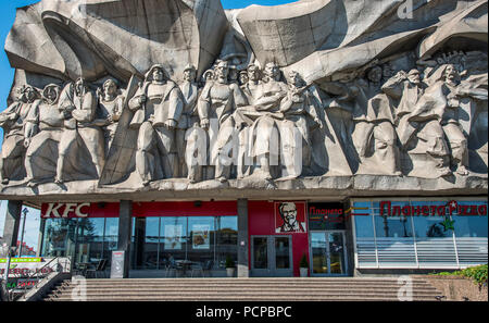 KFC with Soviet Socialist Realism sculpture above. Minsk, Belarus Stock ...
