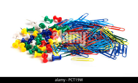 Bunch of colorful paper clips and tacks isolated on white background ...