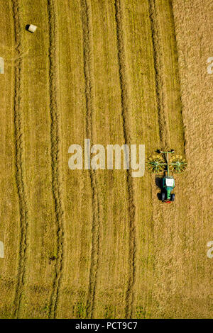 Aerial view to harvested field with straw bales in summer Stock Photo ...